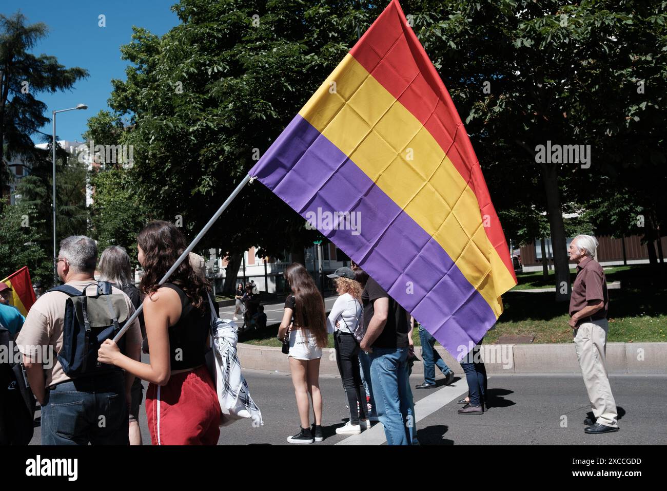 People protest during a march against the monarchy, the end of King ...