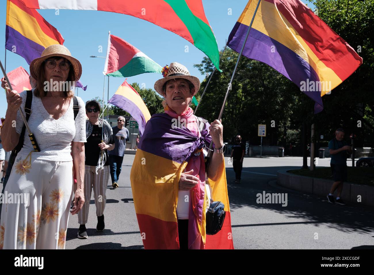 People protest during a march against the monarchy, the end of King ...
