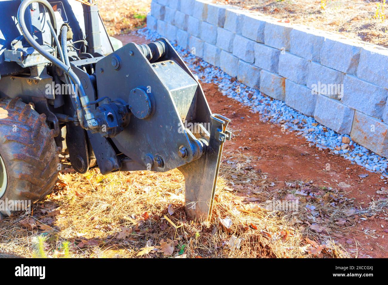 Using trencher cable plow tractor to lay fiber optic cables Stock Photo ...
