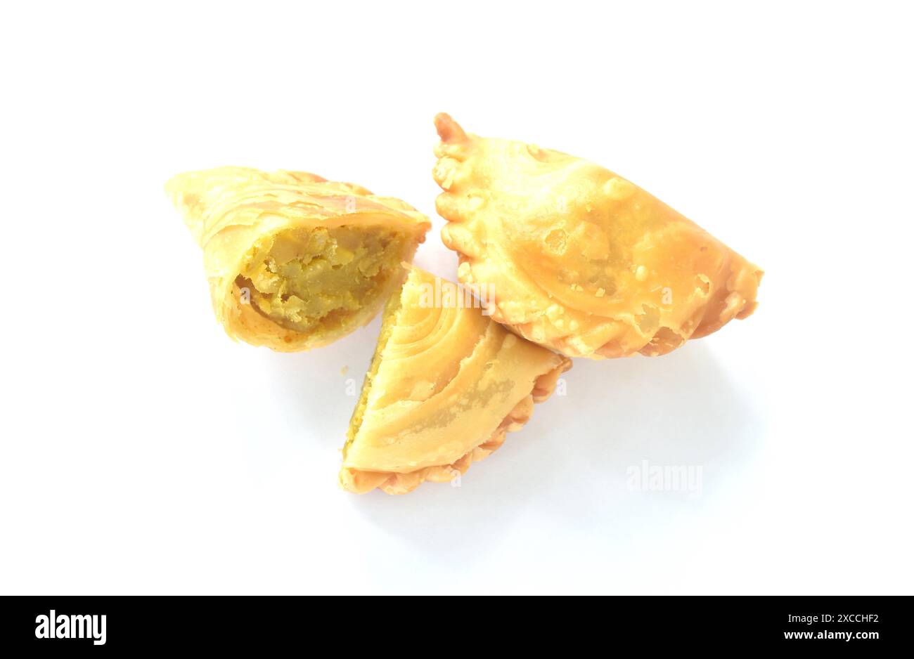 mini chicken filled curry puff arranging on white background Stock ...