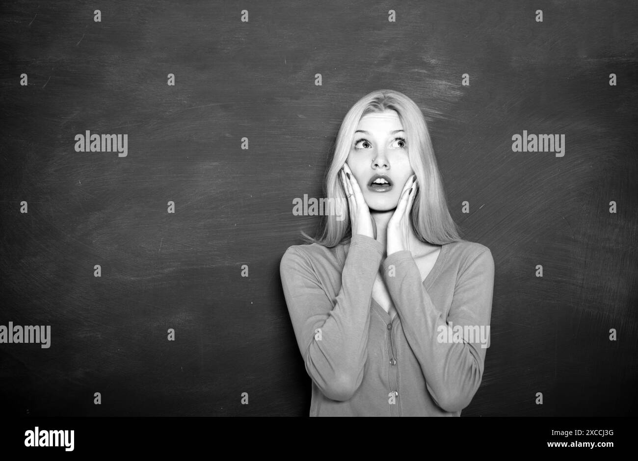 Modern attractive teacher. Portrait of smart young teacher with ...