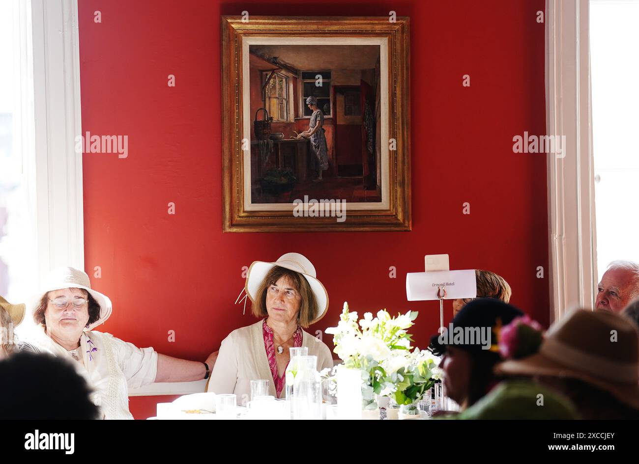 People watch a performance during the Bloomsday Breakfast at Belvedere ...