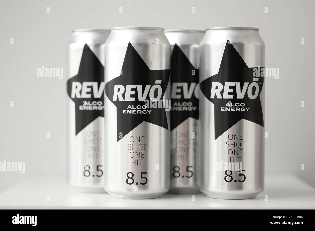 KYIV, UKRAINE - APRIL 20, 2024 Cans of Revo alco energy drink in new ...