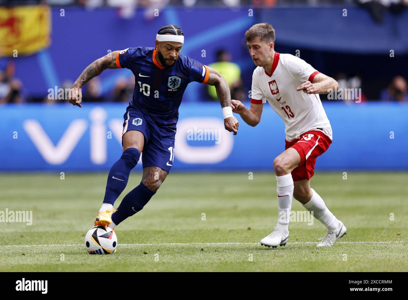 HAMBURG - (l-r) Memphis Depay of Holland, Taras Romanczuk of Poland ...