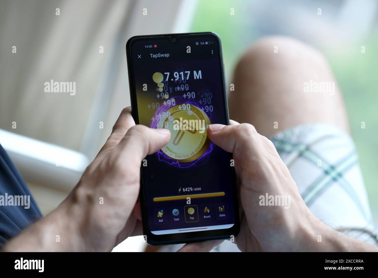 KYIV, UKRAINE - APRIL 20, 2024 Tap Swap telegram bot on smartphone ...