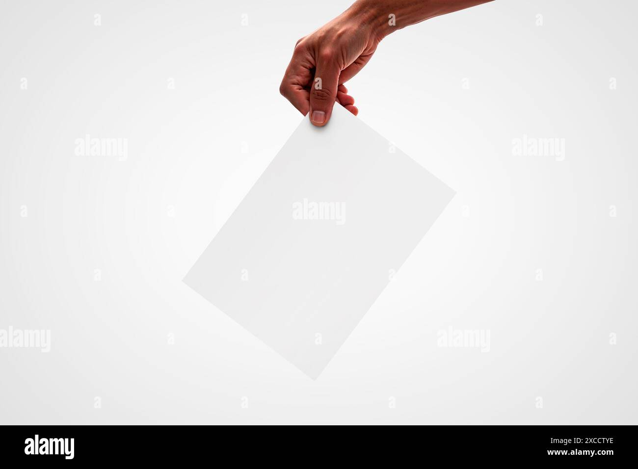 Holding A4 Paper with Hand Isolated on White Background Stock Photo - Alamy