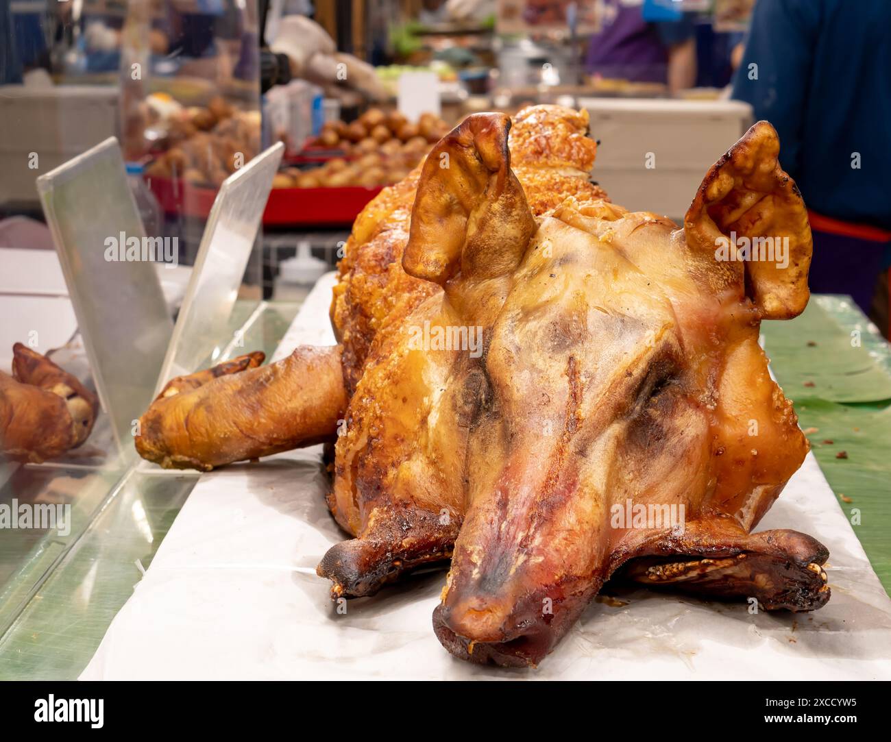 Whole roasted suckling pig is on sale in supermarket in Thailand Stock ...