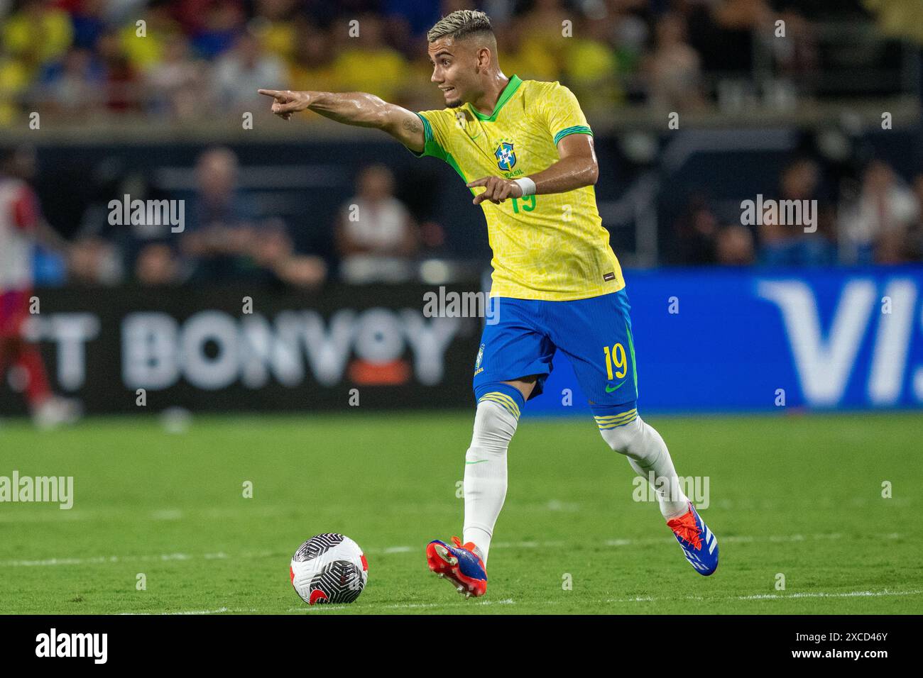 Brazil National Team midFielder Andreas Pereira (19) dribbles forward ...