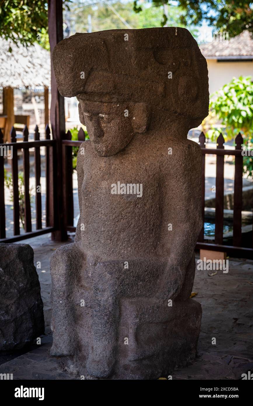 Pre-Columbian stone idol in the churchyard in Altagracia, Ometepe ...