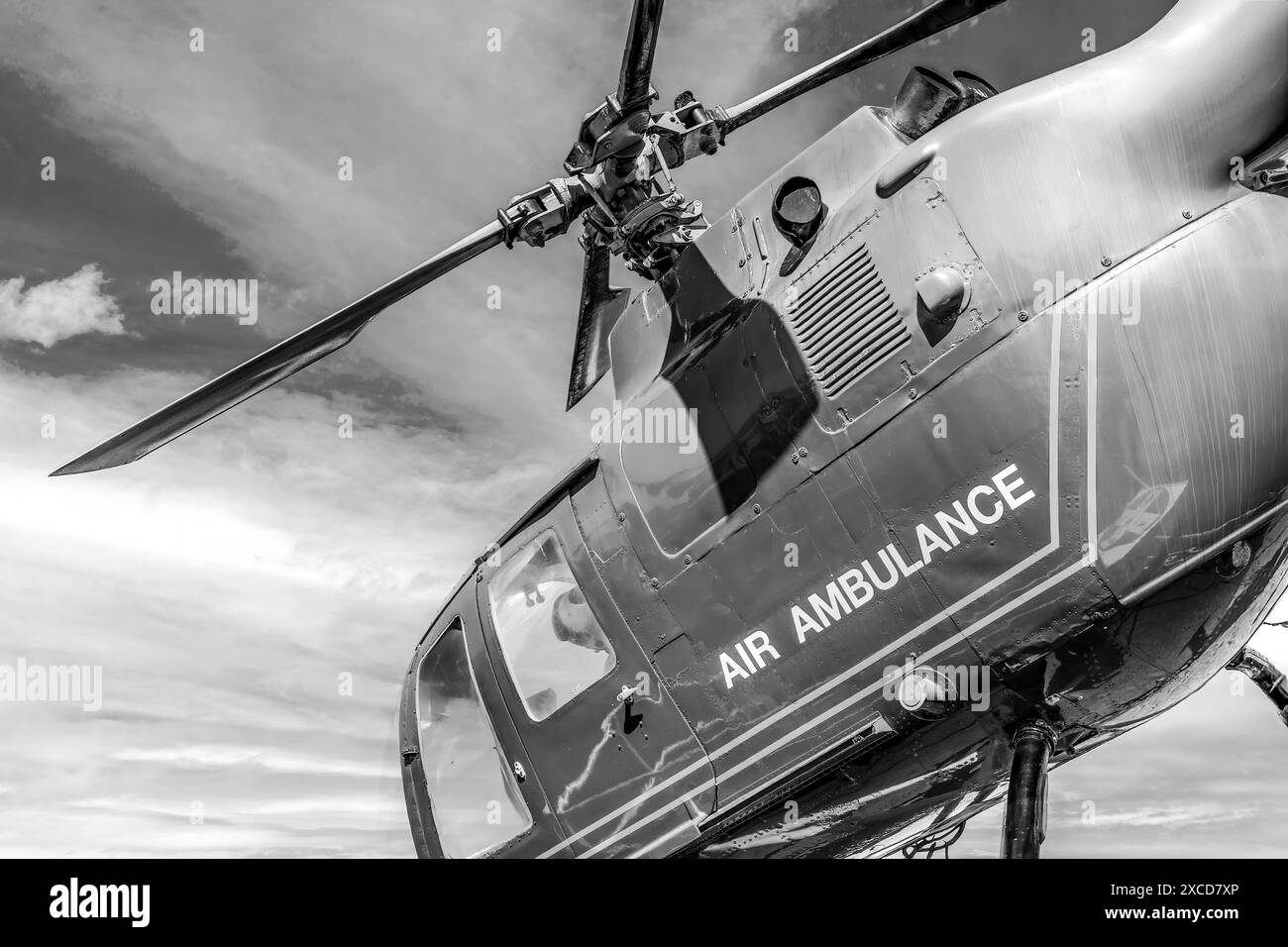 Air ambulance helicopter in action with rotor blades spinning. Close-up ...