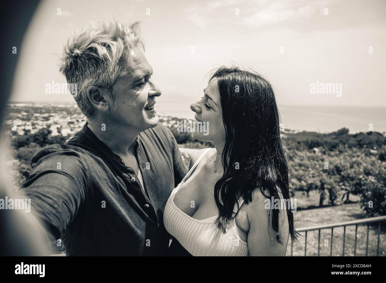 Seaside love captured, an intimate coastal selfie shared in joyous ...