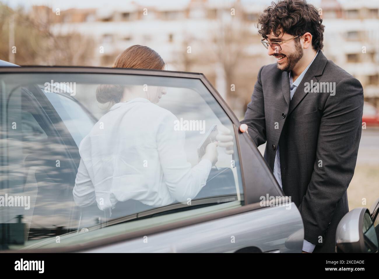 Car key handover hi-res stock photography and images - Alamy