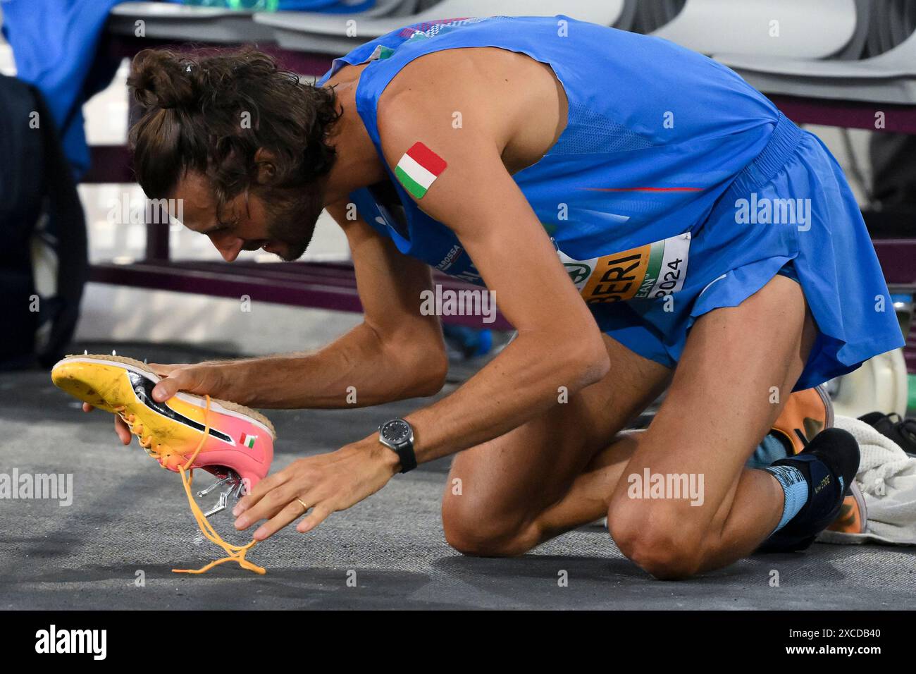 Gianmarco Tamberi of Italy makes a jokes with his shoes and some ...