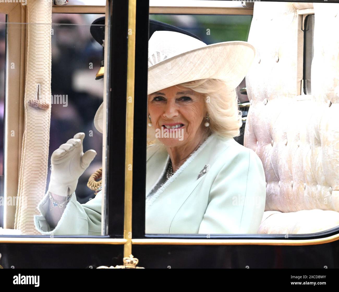 London, England. UK. 15 June 2024. Queen Camilla travels down the Mall ...