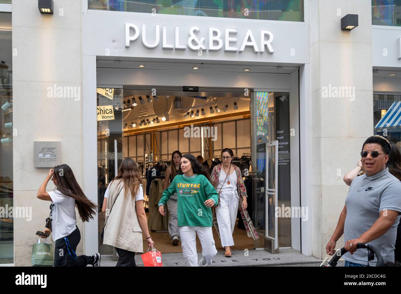 Shoppers are seen at the Spanish multinational clothing design retail company by Inditex, Pull ...