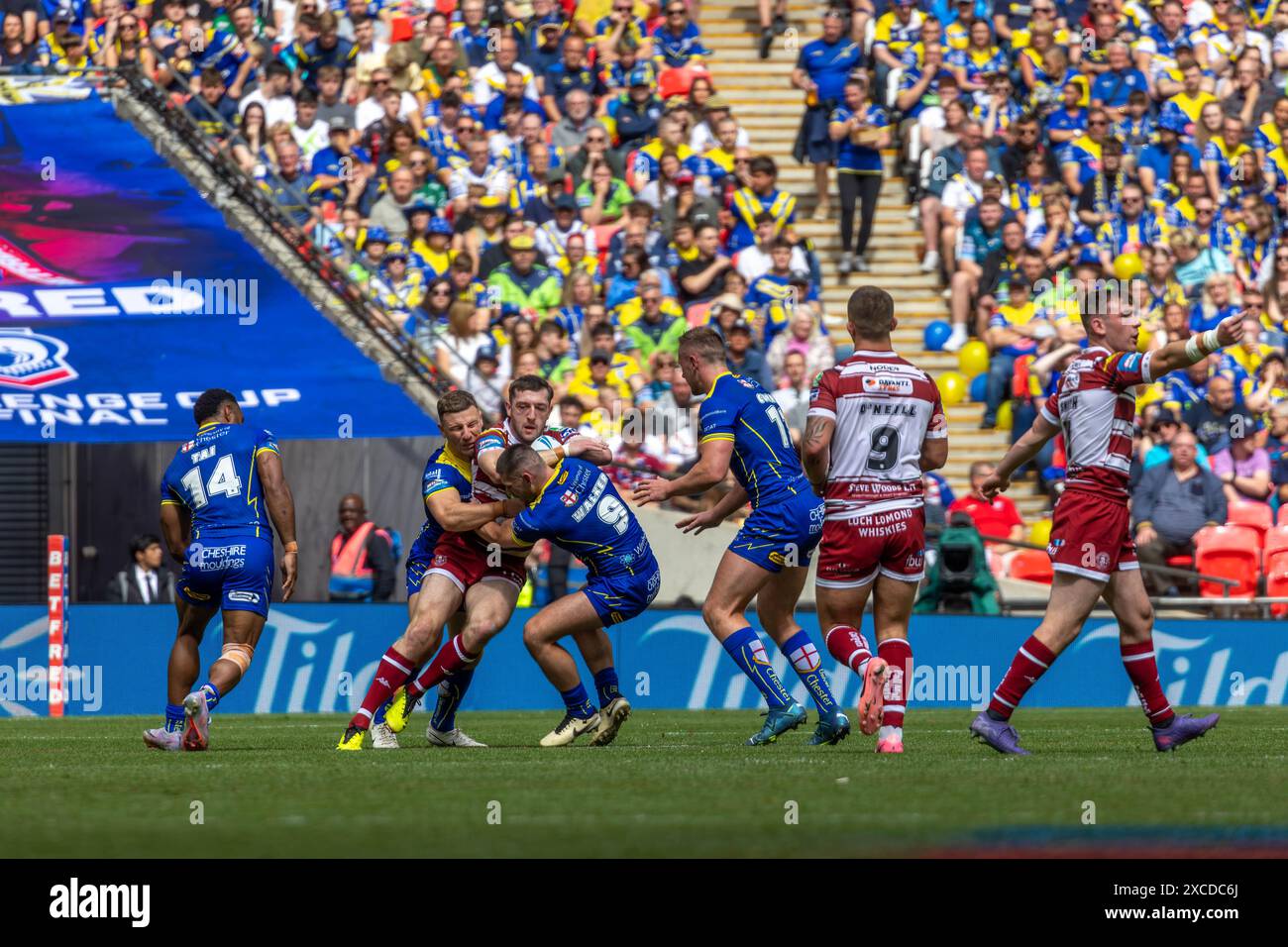 The 2024 Betfred Challenge Cup Final. Jake Wardle is stopped by Danny ...