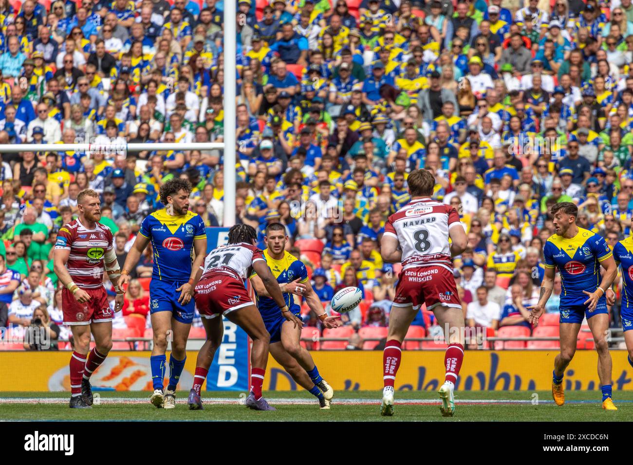 The 2024 Betfred Challenge Cup Final. Danny Walker passes the ball to ...