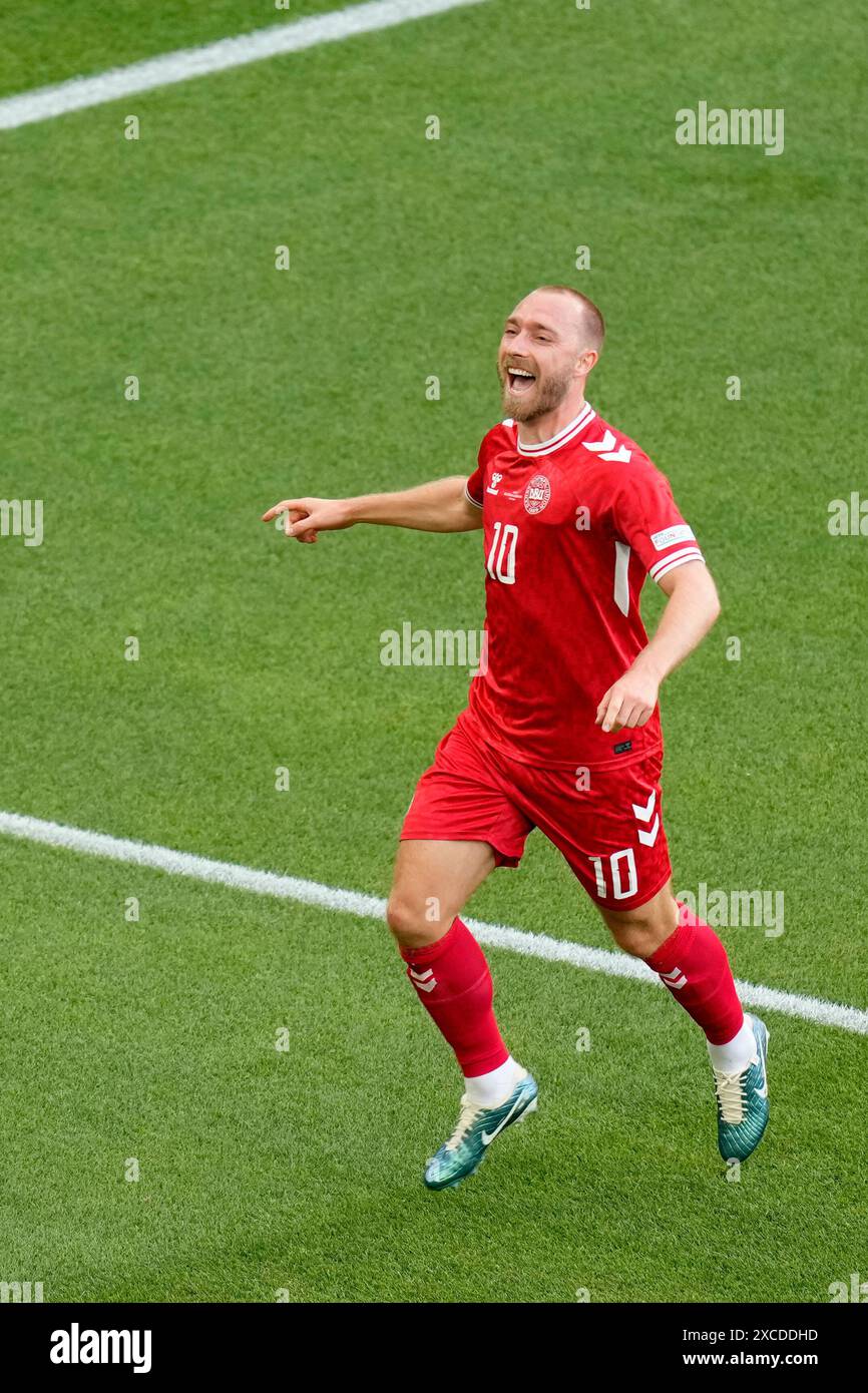 Denmark's Christian Eriksen celebrates after scoring the opening goal ...