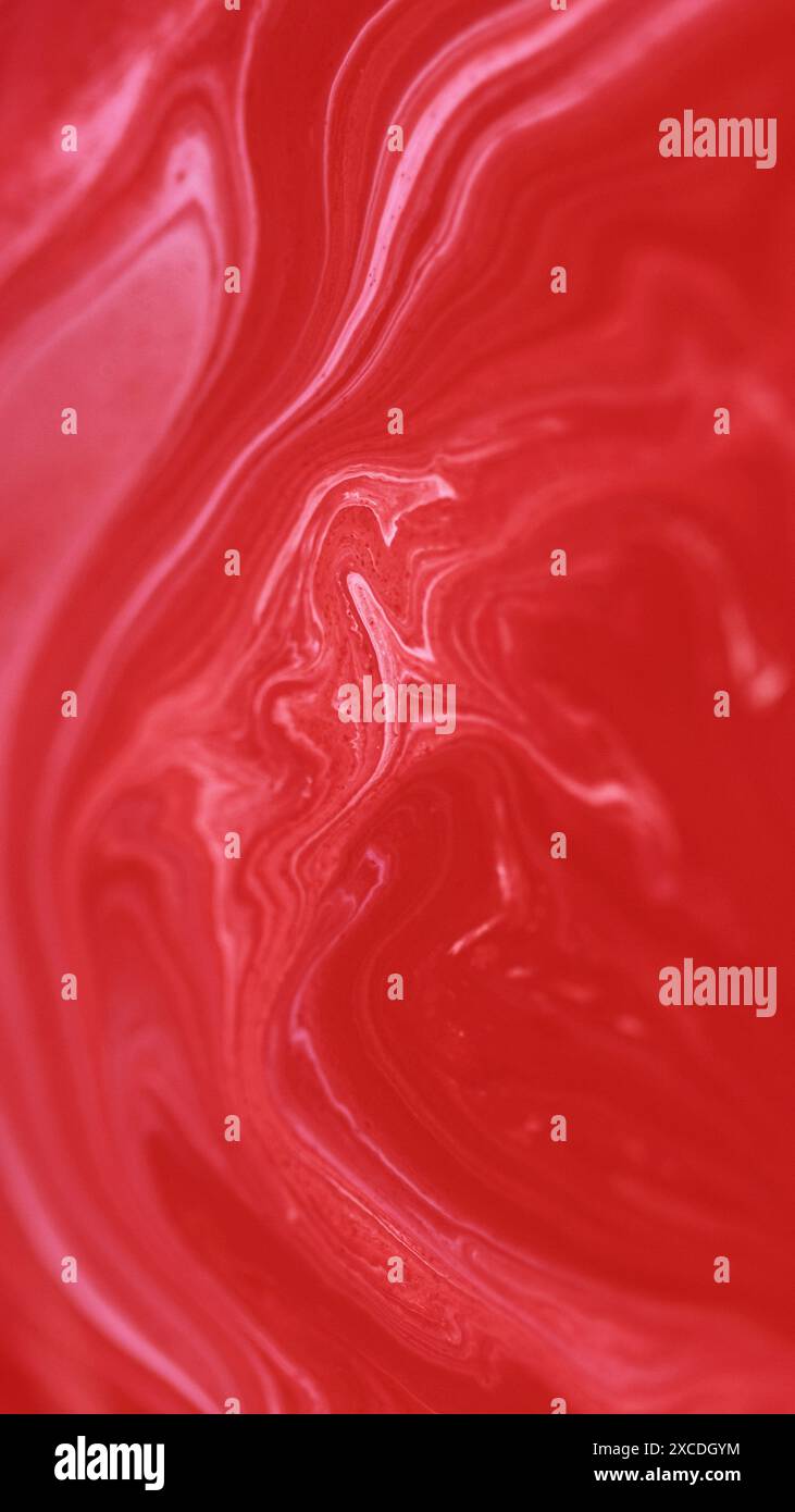 Ink fluid flow. Acrylic dye wave. Defocused red white color pigment ...