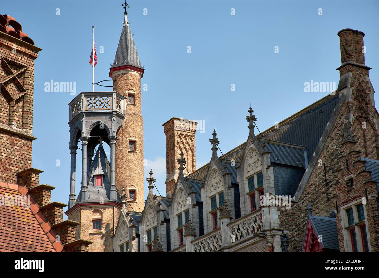 Bruges, Belgium; June,06,2024; Beautiful dormers and turrets protrude ...