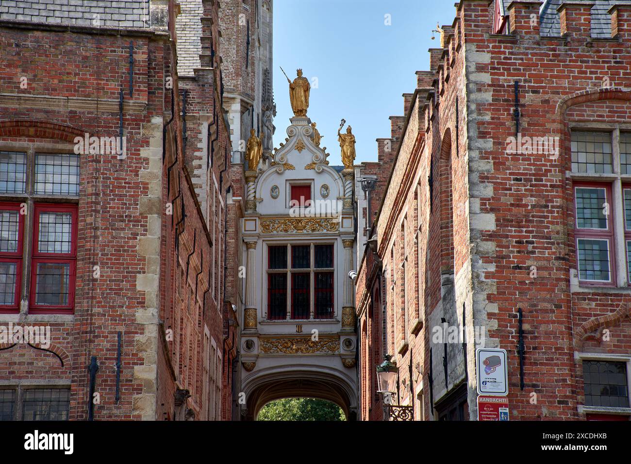 Bruges, Belgium; June,06,2024; Beautiful dormers and turrets protrude ...