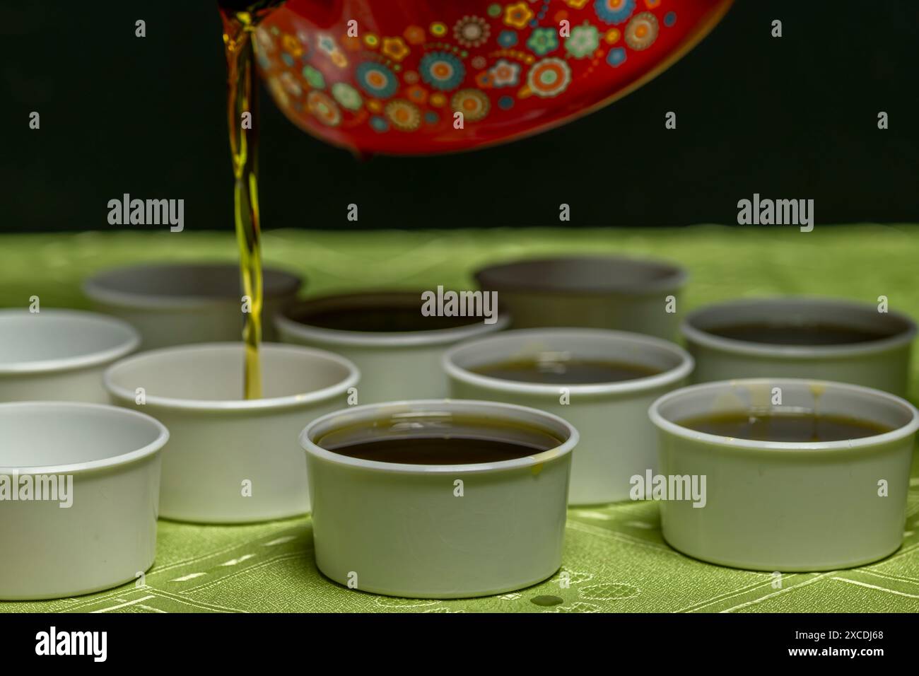 Making of marijuana healthy salve with black background and red cooking ...