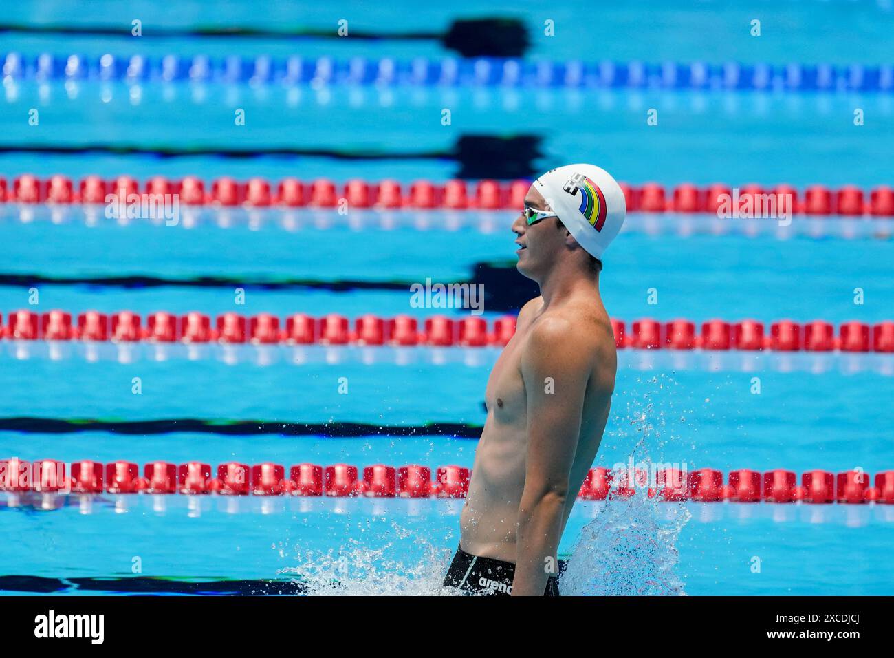 Tim Gallagher jumps into the pool for the Men's 100 backstroke ...