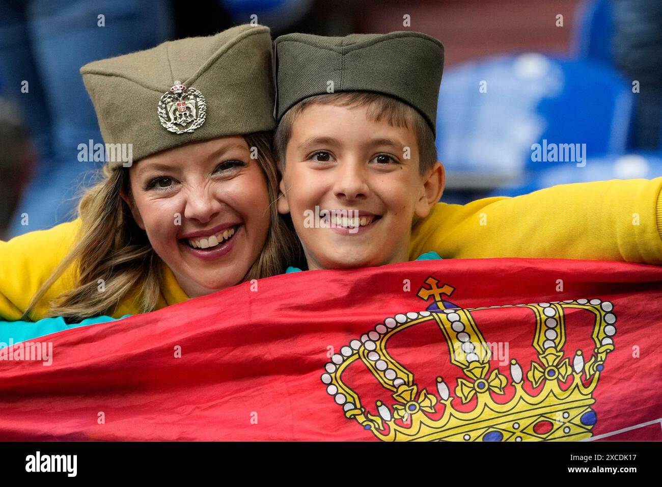 Serbia's fans pose ahead of a Group C match between Serbia and England ...