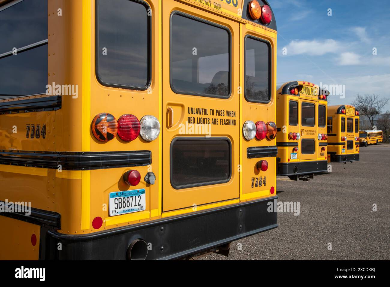 School buses line up hi-res stock photography and images - Alamy
