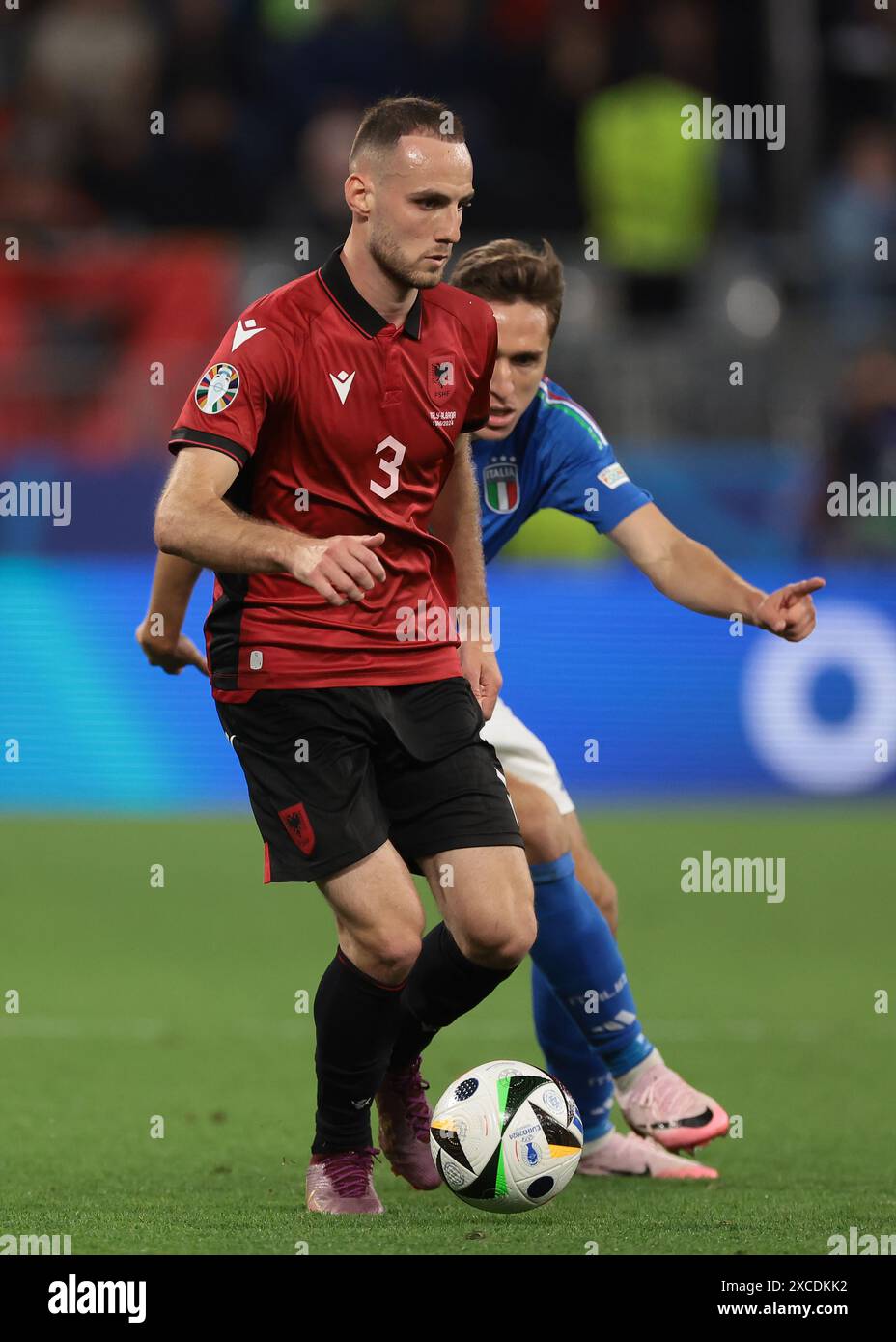 Dortmund, Germany. 15th June, 2024. Mario Mitaj of Albania is pursued ...