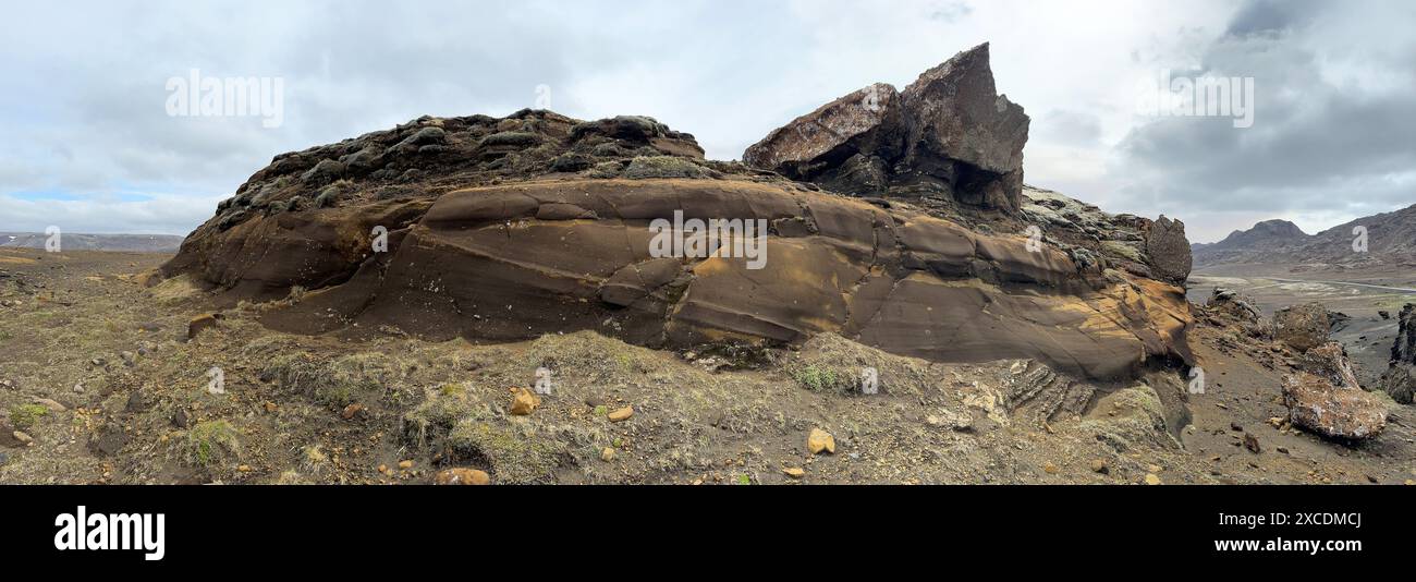 A Large Rock Formation on a Volcanic Landscape in Iceland Stock Photo ...