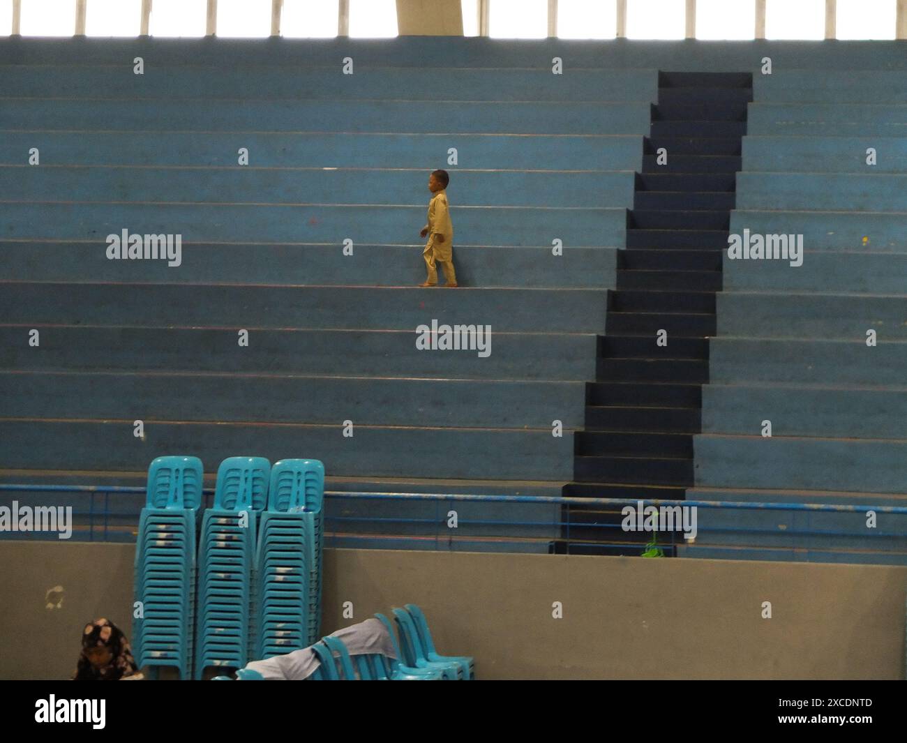 Malabon, Philippines. 16th June, 2024. A muslim boy seen walking around ...
