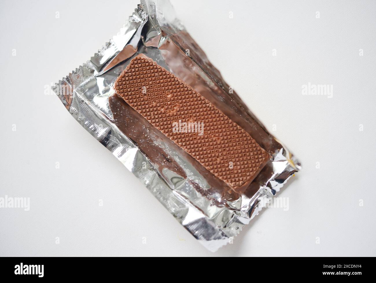 A sweet chocolate bar in a package. A waffle chocolate bar Stock Photo ...
