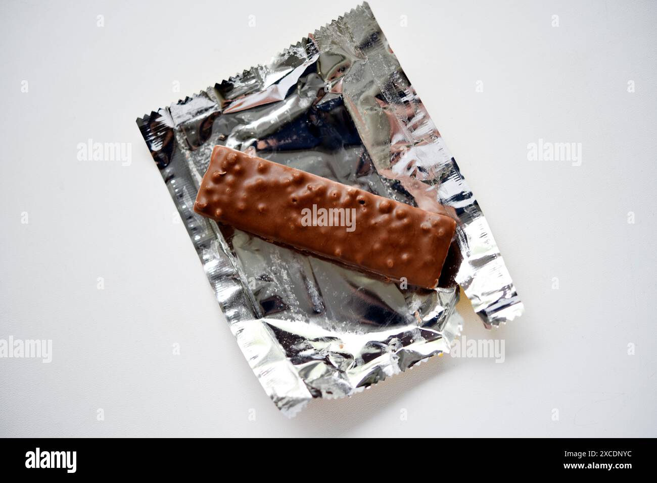 A sweet chocolate bar in a package. A waffle chocolate bar Stock Photo ...