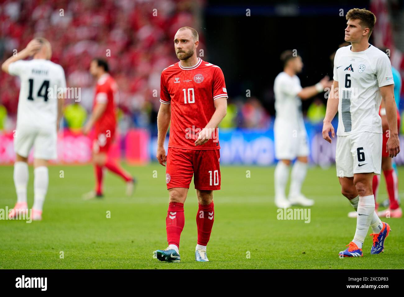 Denmark's Christian Eriksen (centre) reacts following the UEFA Euro ...