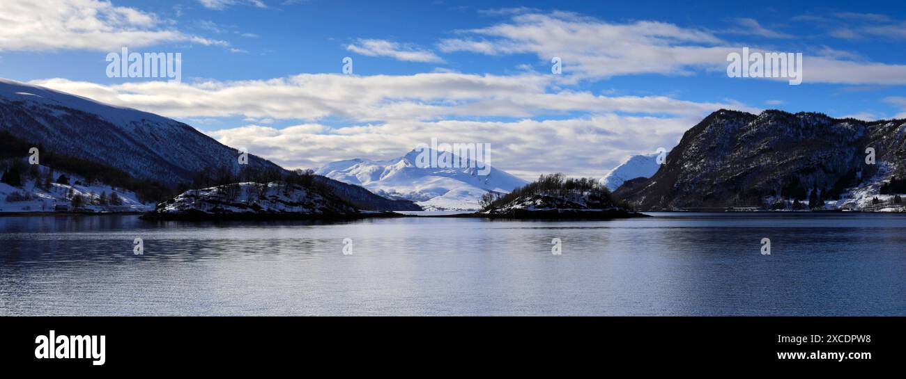 View from a boat of the mountains along Ramfjord, a scenic Fjord south ...