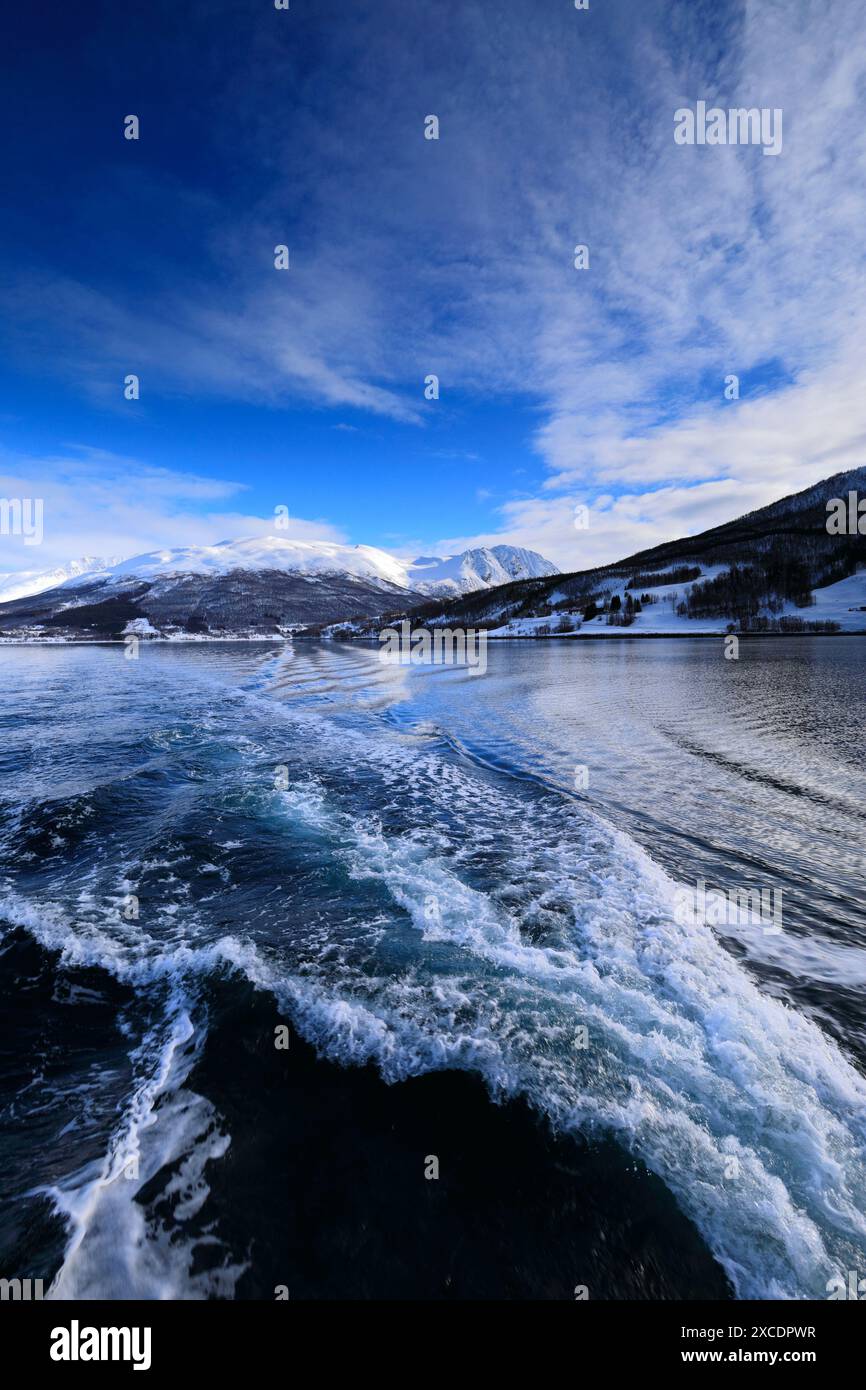 View from a boat of Ramfjord, a scenic Fjord south of Tromso city ...