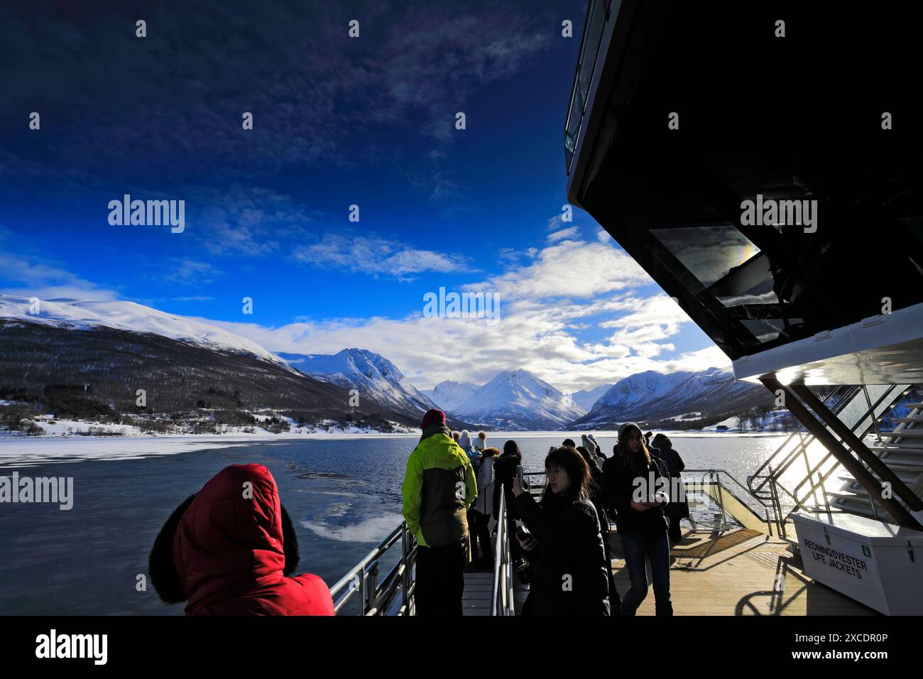 View from a boat of Ramfjord, a scenic Fjord south of Tromso city ...
