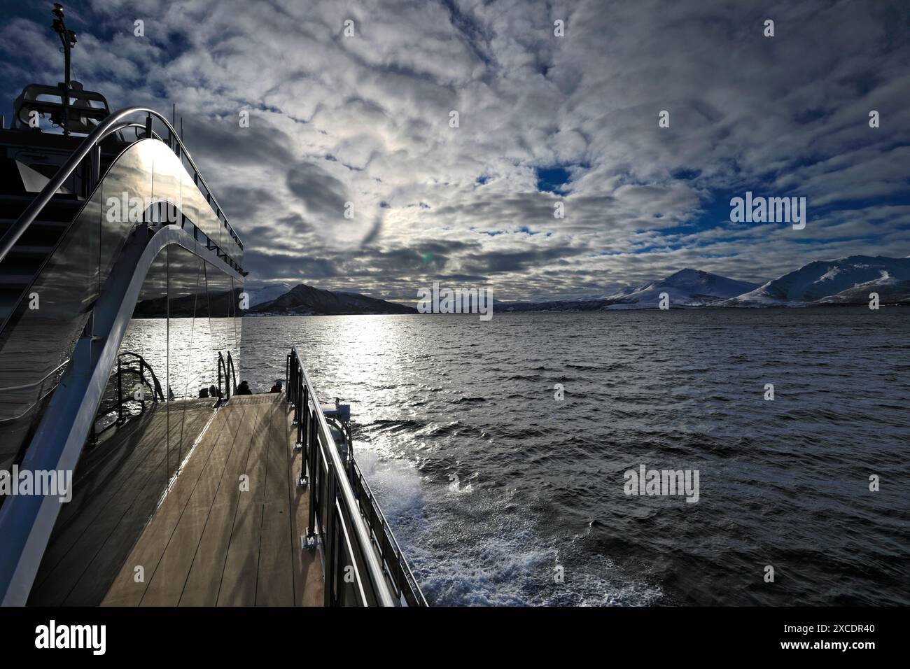 View from a boat of Ramfjord, a scenic Fjord south of Tromso city ...
