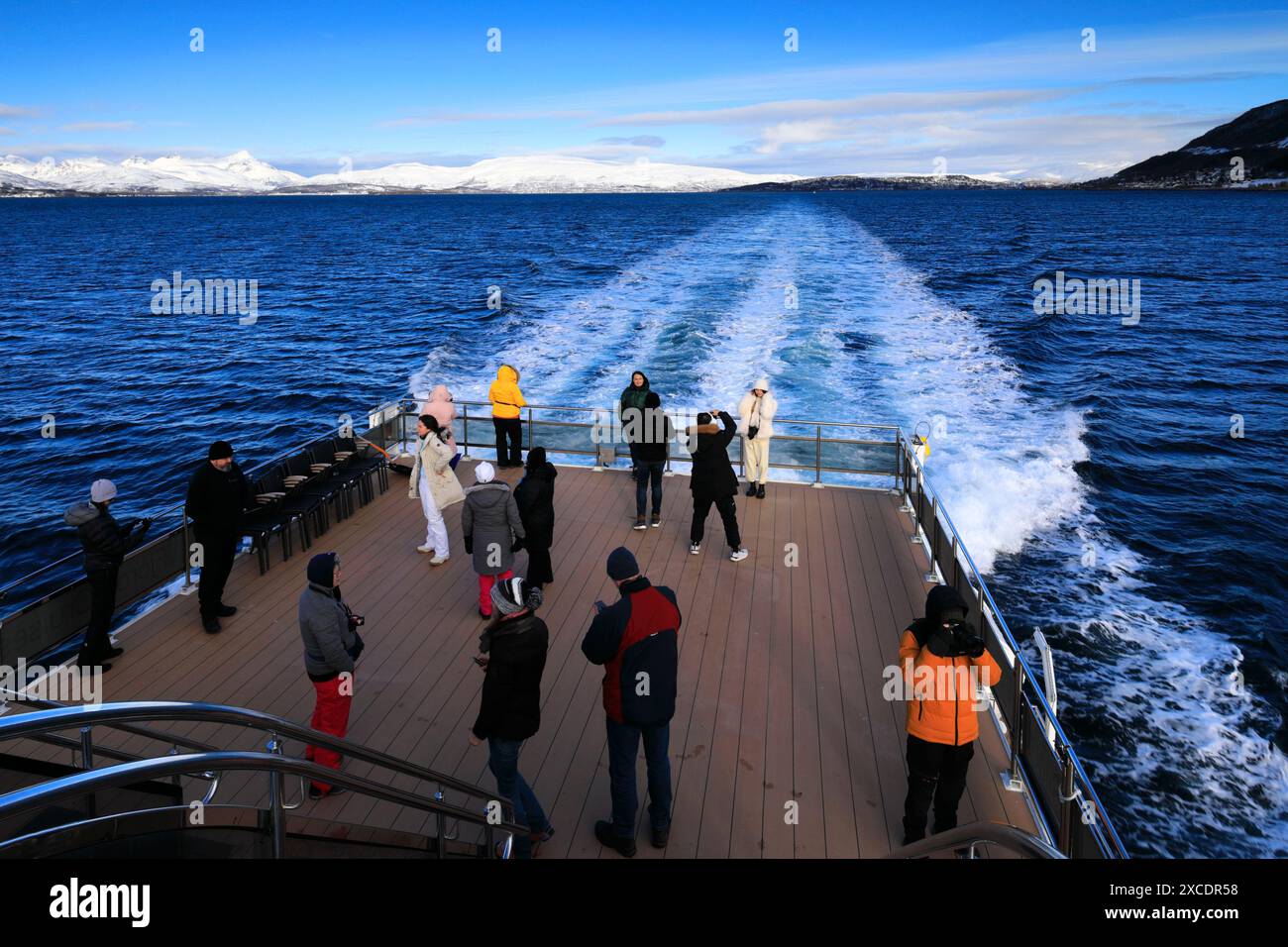 View from a boat of Ramfjord, a scenic Fjord south of Tromso city ...