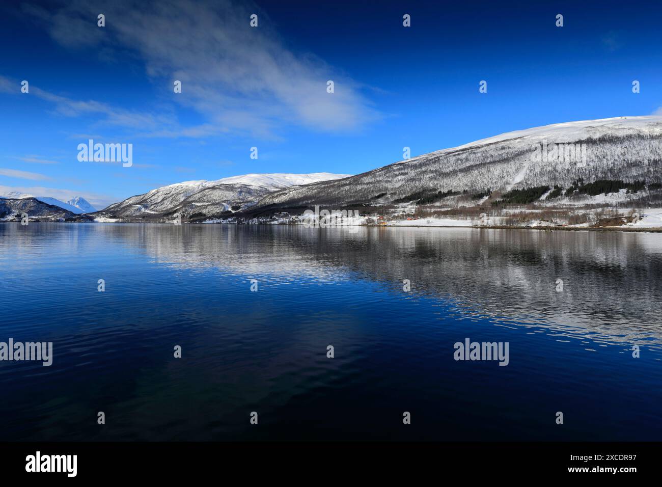 View from a boat of the mountains along Ramfjord, a scenic Fjord south ...