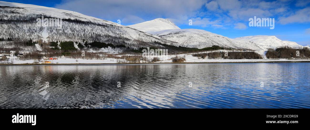 View from a boat of the mountains along Ramfjord, a scenic Fjord south ...
