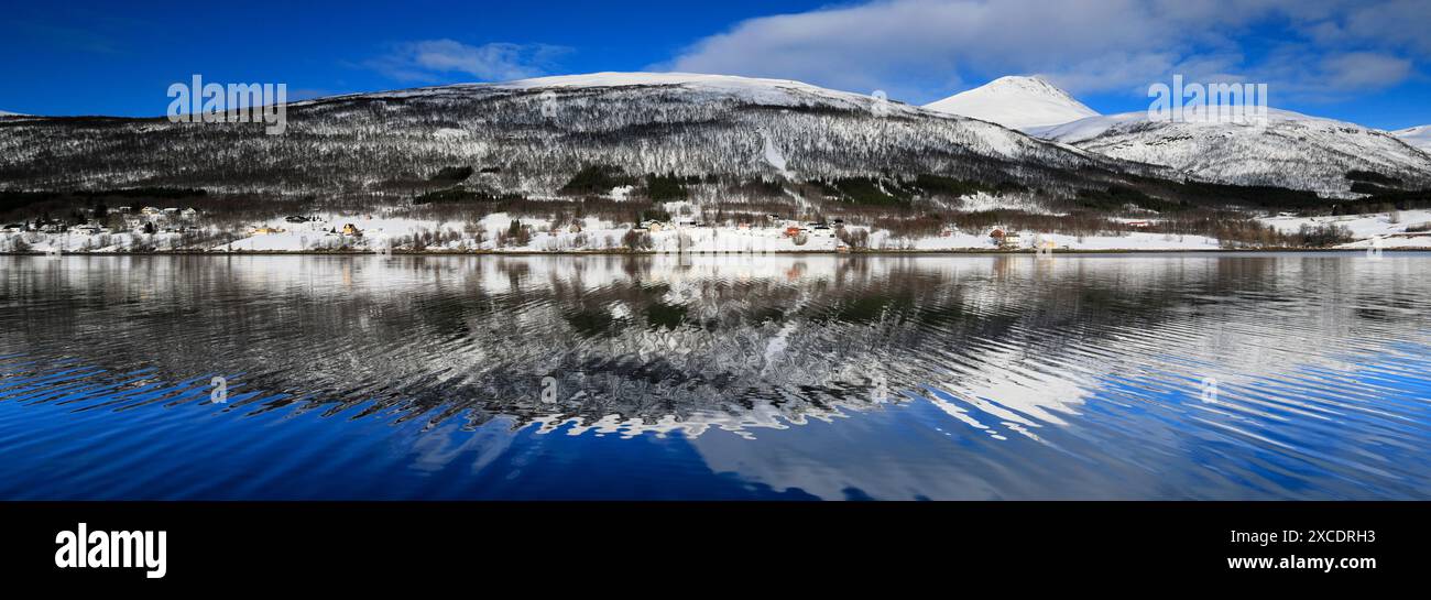 View from a boat of the mountains along Ramfjord, a scenic Fjord south ...