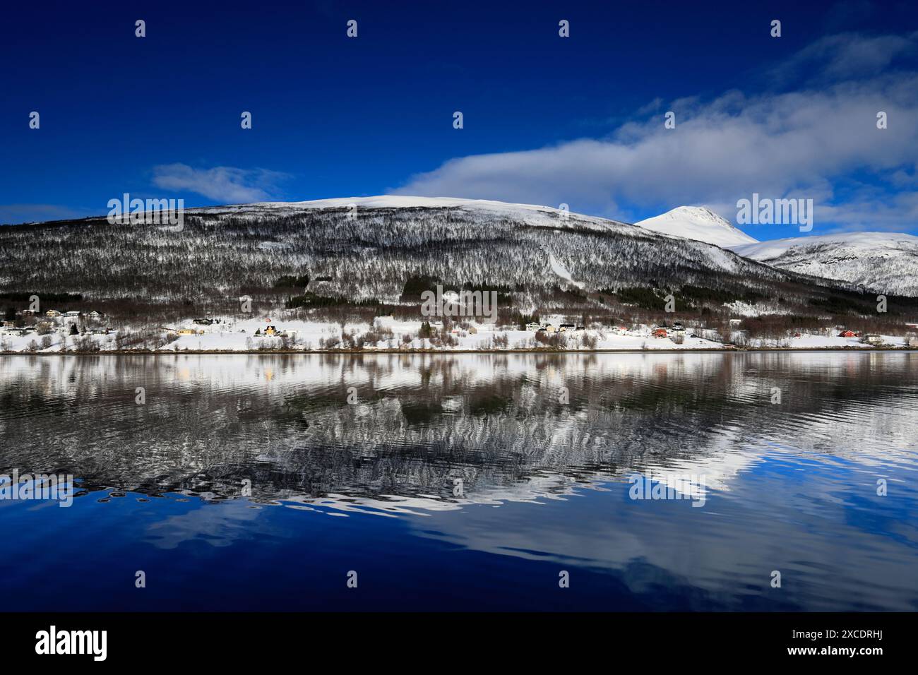 View from a boat of the mountains along Ramfjord, a scenic Fjord south ...
