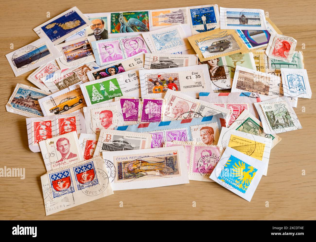 A collection of used European countries postal stamps cut off from ...