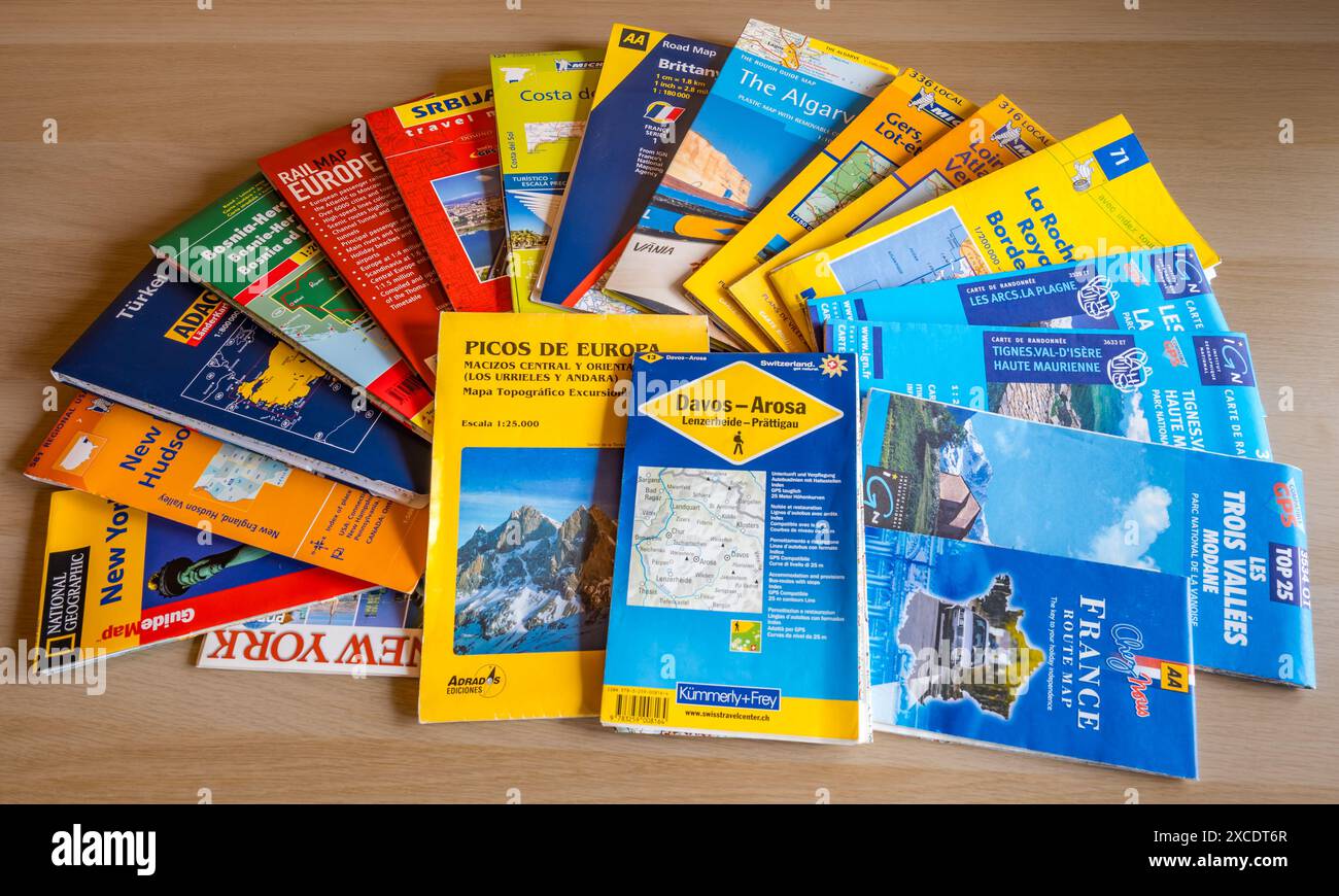 Display of European and US paper road and walking maps including France ...