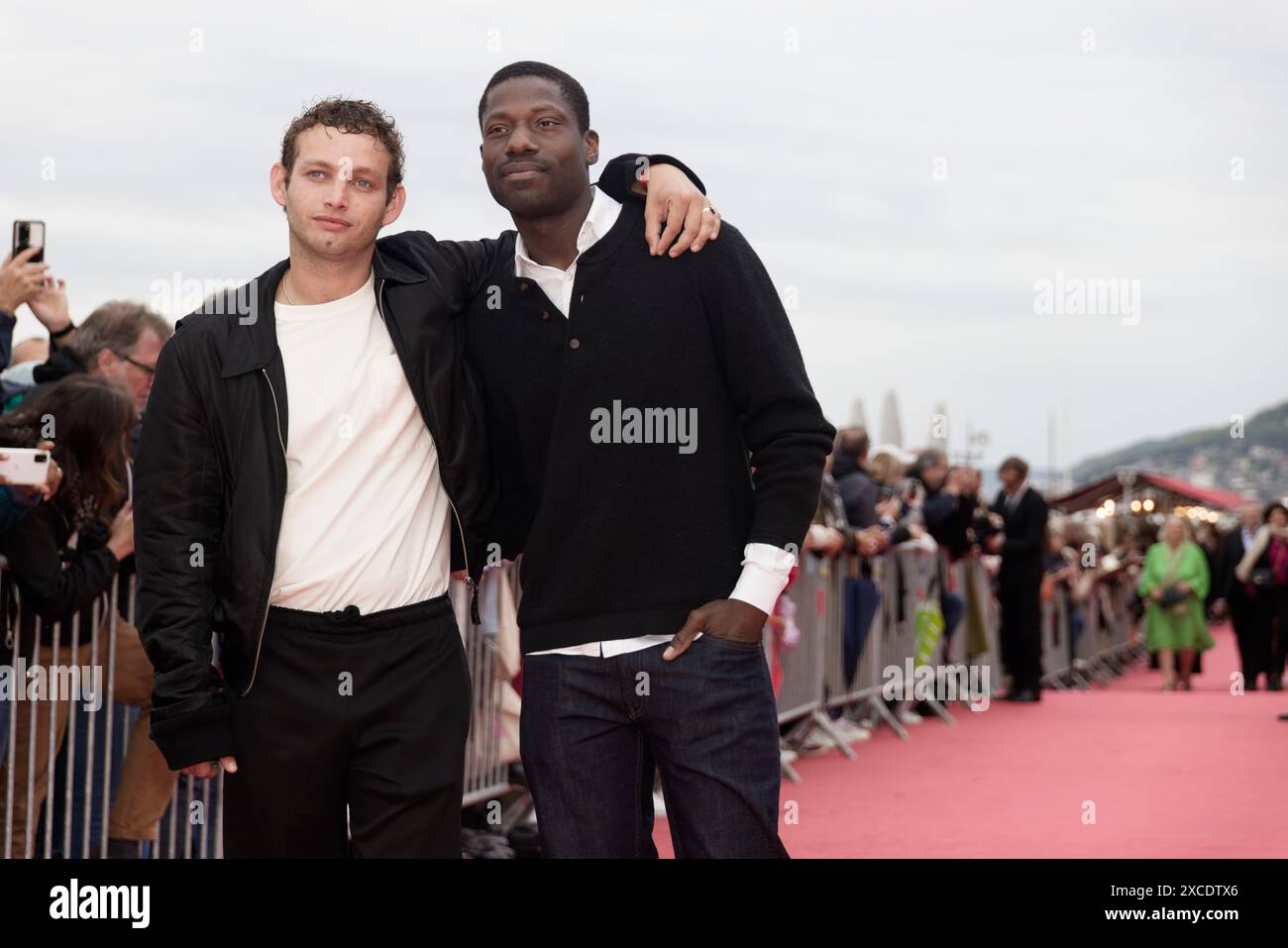 Cabourg, France. 15th June, 2024. Theo Cholbi and Erwan Kepoa Fale walk ...