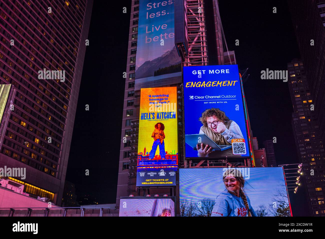 Beautiful night view of skyscraper facades with LED panels advertising ...