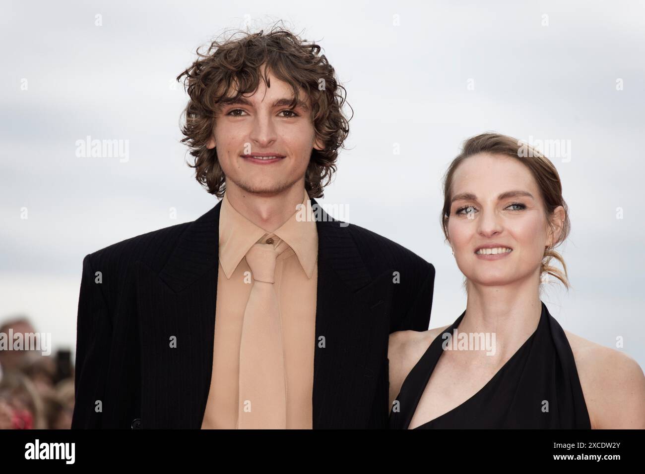 Cabourg, France. 15th June, 2024. Vassili Schneider and Adele Simphal walk the red carpet during ...