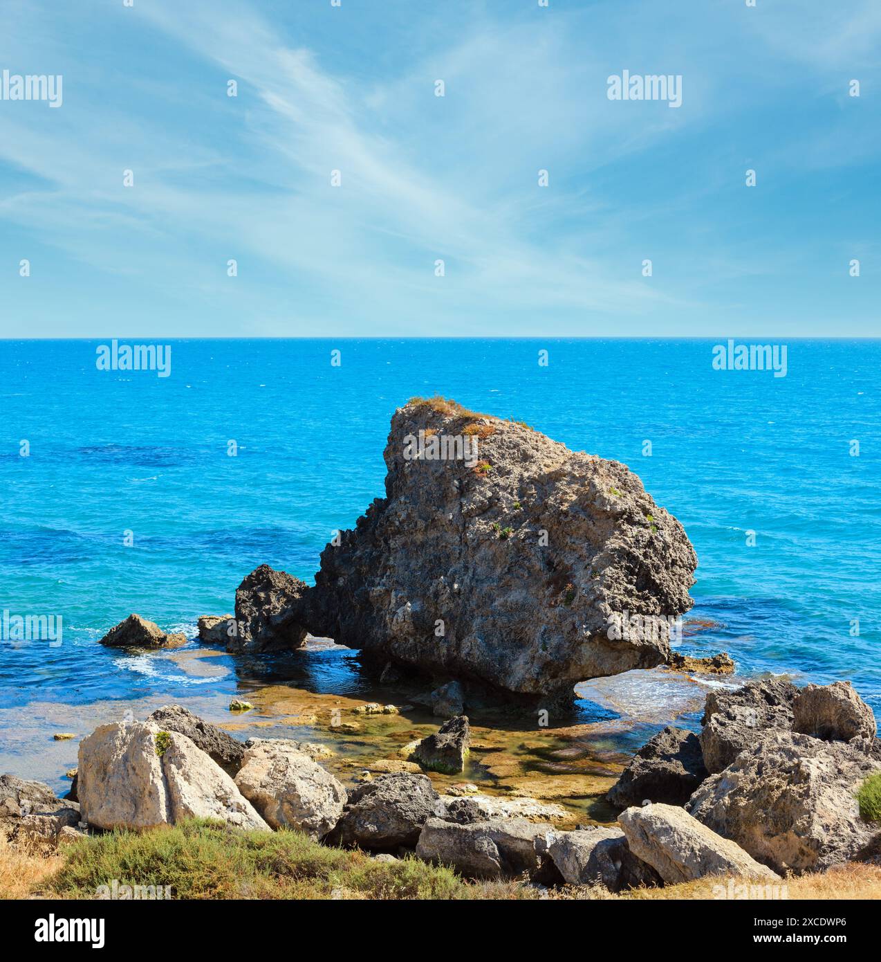 Rock in sea near beach Cala Paradiso near Rocca di San Nicola ...